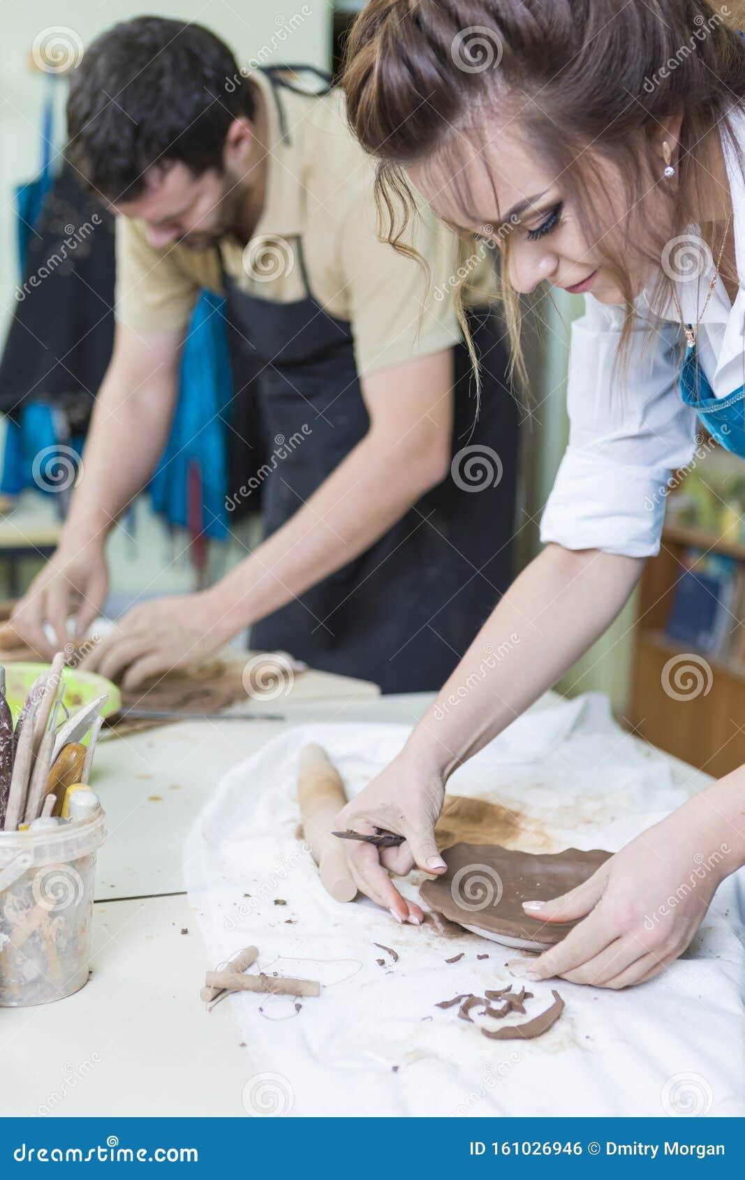 Pottering Concept. Professional Ceramists or Claymakers during a ...