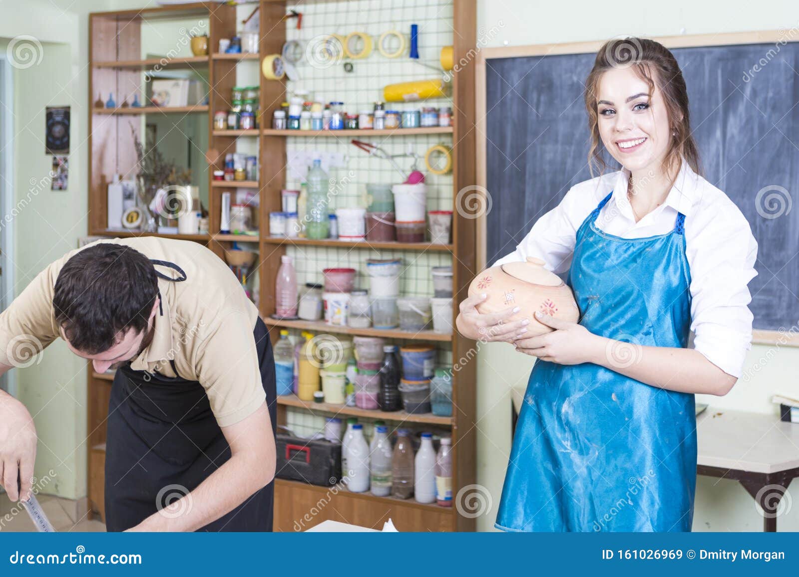 Pottering Concept. Professional Ceramists during a Working Process in ...