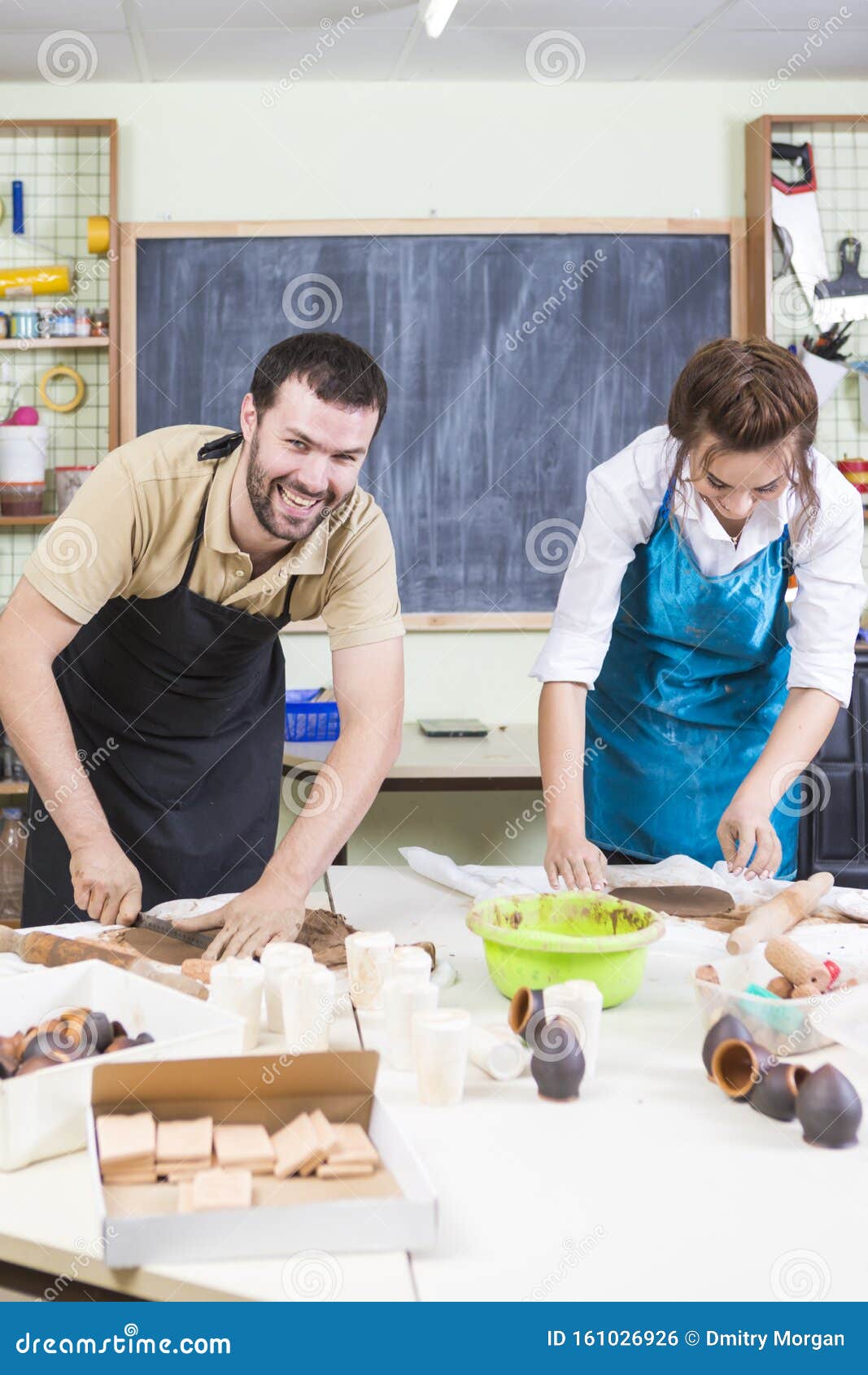 Pottering Concept. Two Happy Professional Ceramists or Claymakers ...