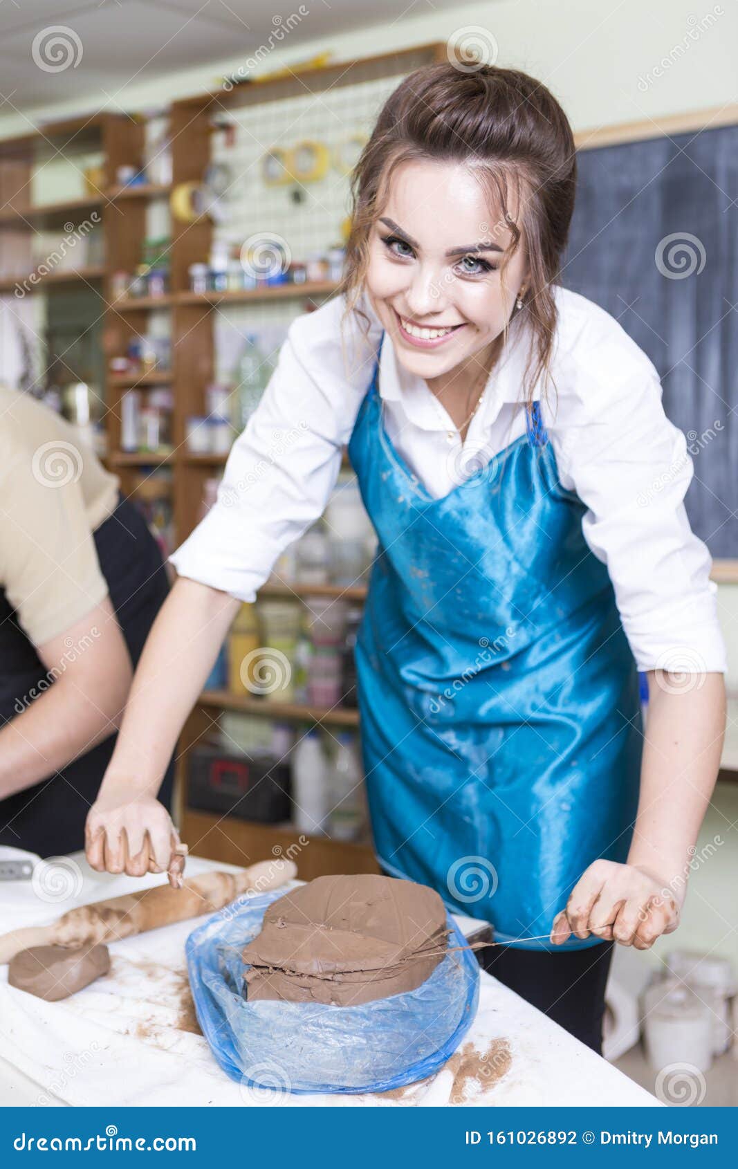 Pottering Ideas and Concepts. Smiling Female Professional Worker ...