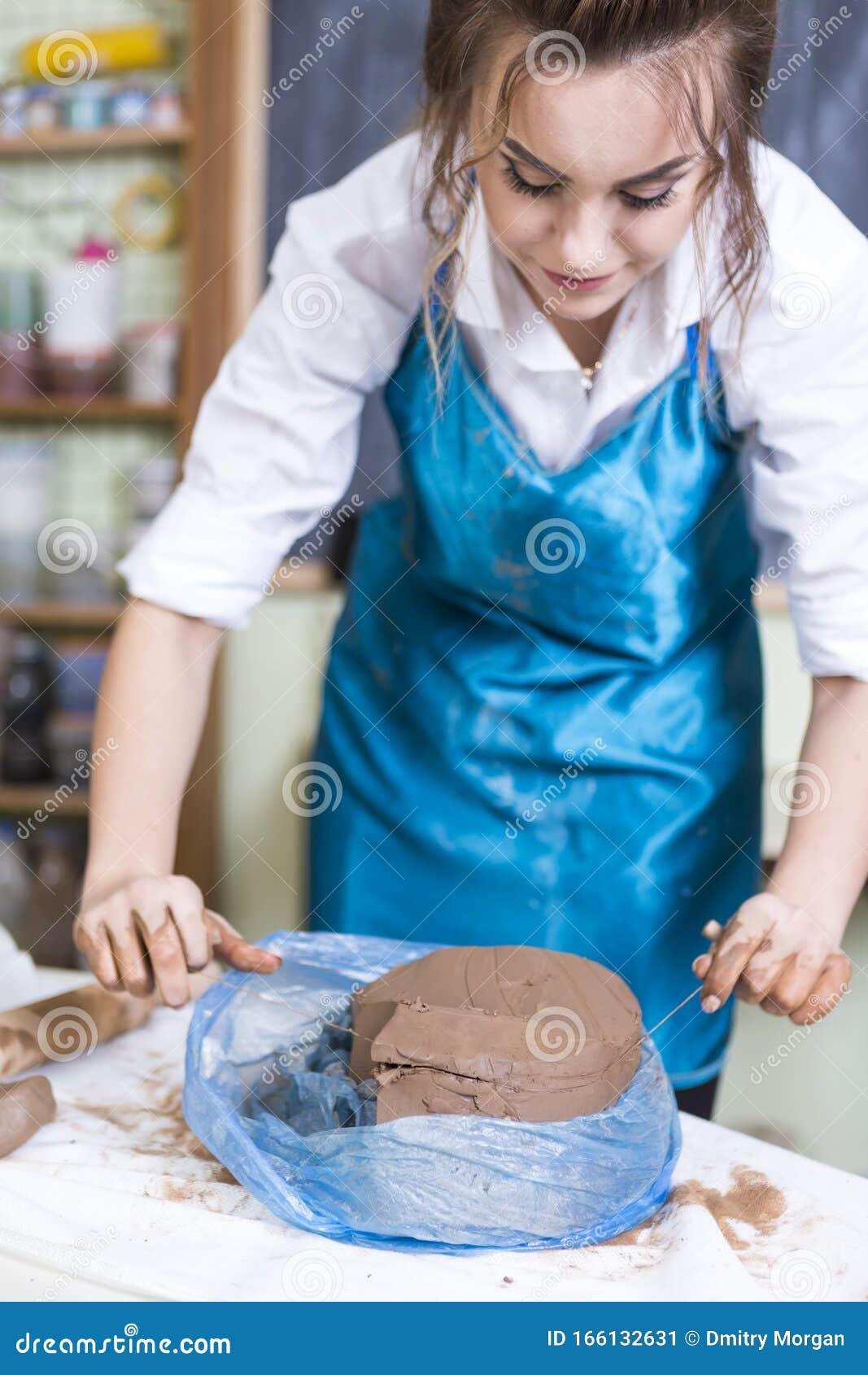 Pottering Ideas And Concepts. Closeup Of Hands Of Male Worker Rolling A ...