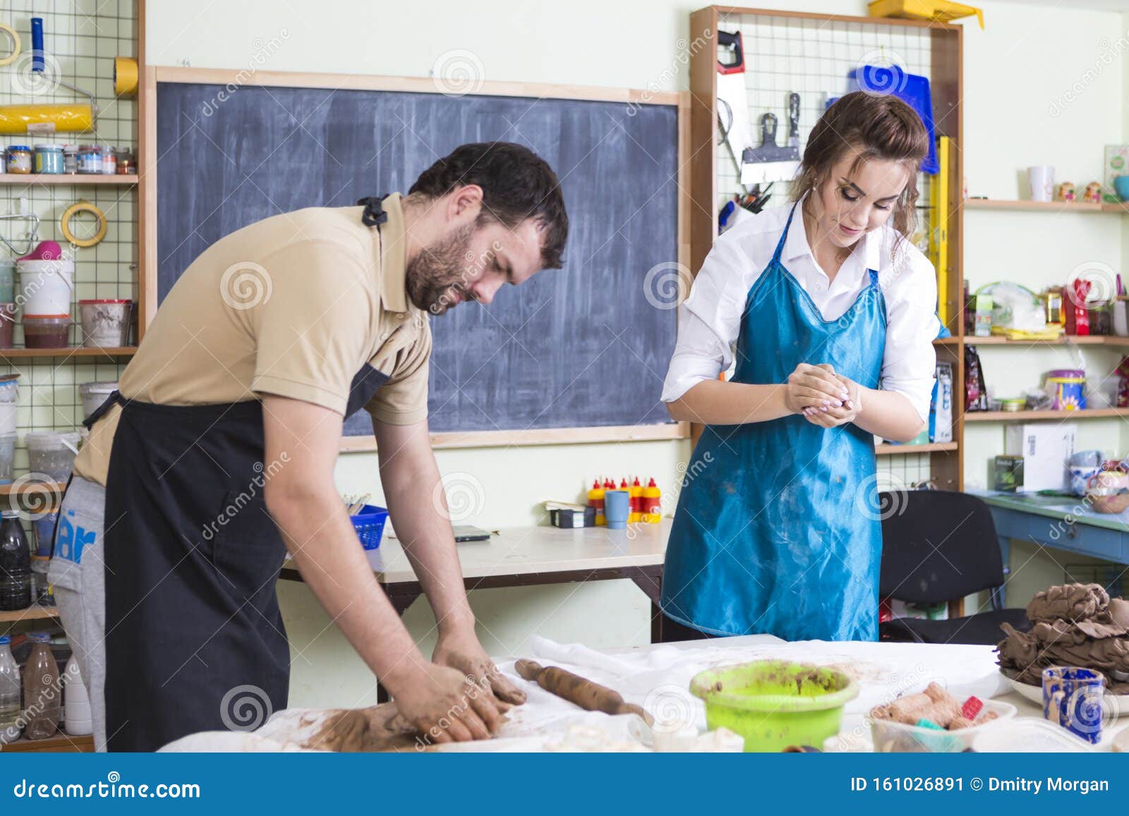 Pottering Process Concept. Two Professional Ceramists or Claymakers ...