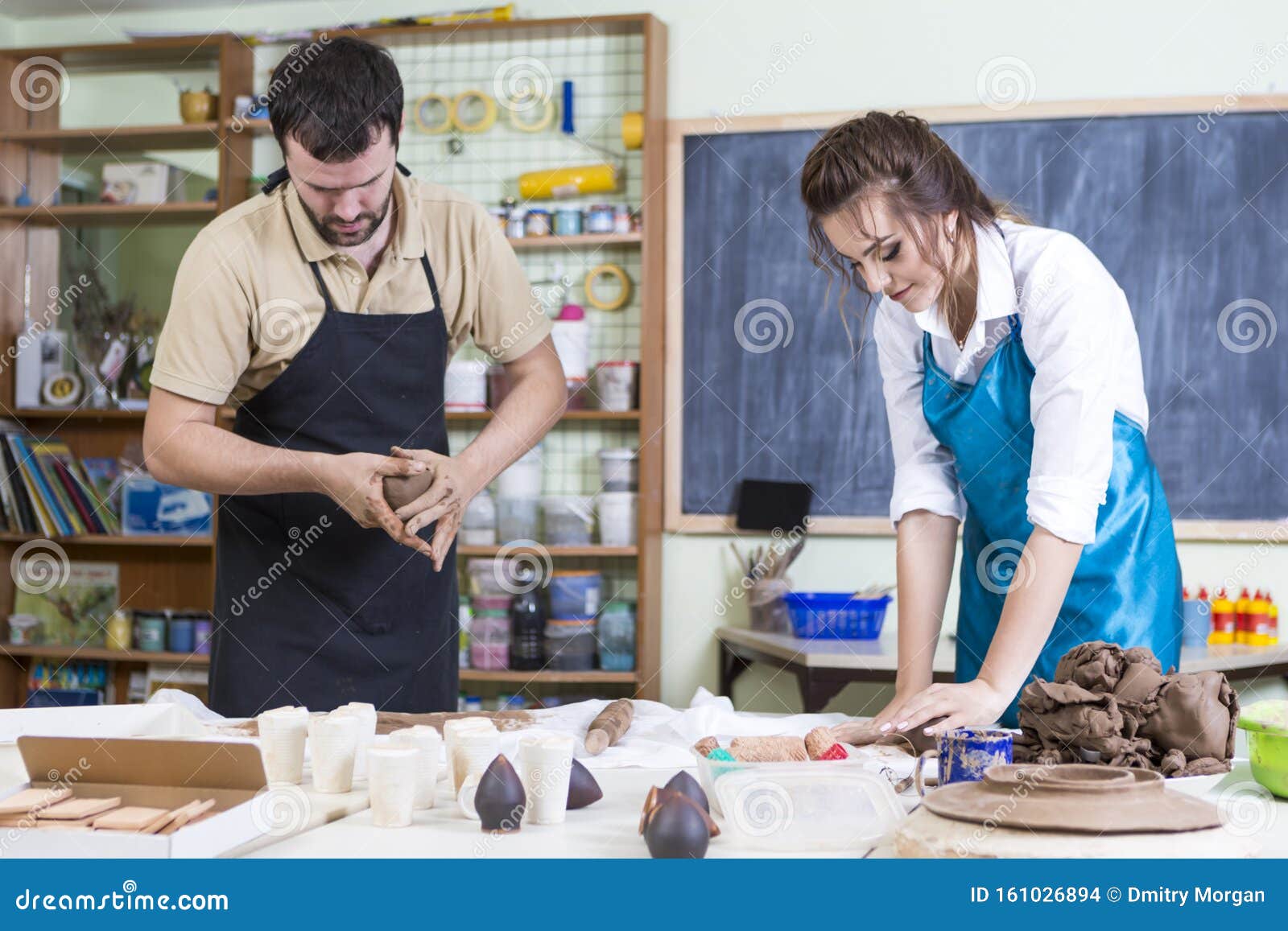 Pottering Process Concept. Two Professional Ceramists or Claymakers ...