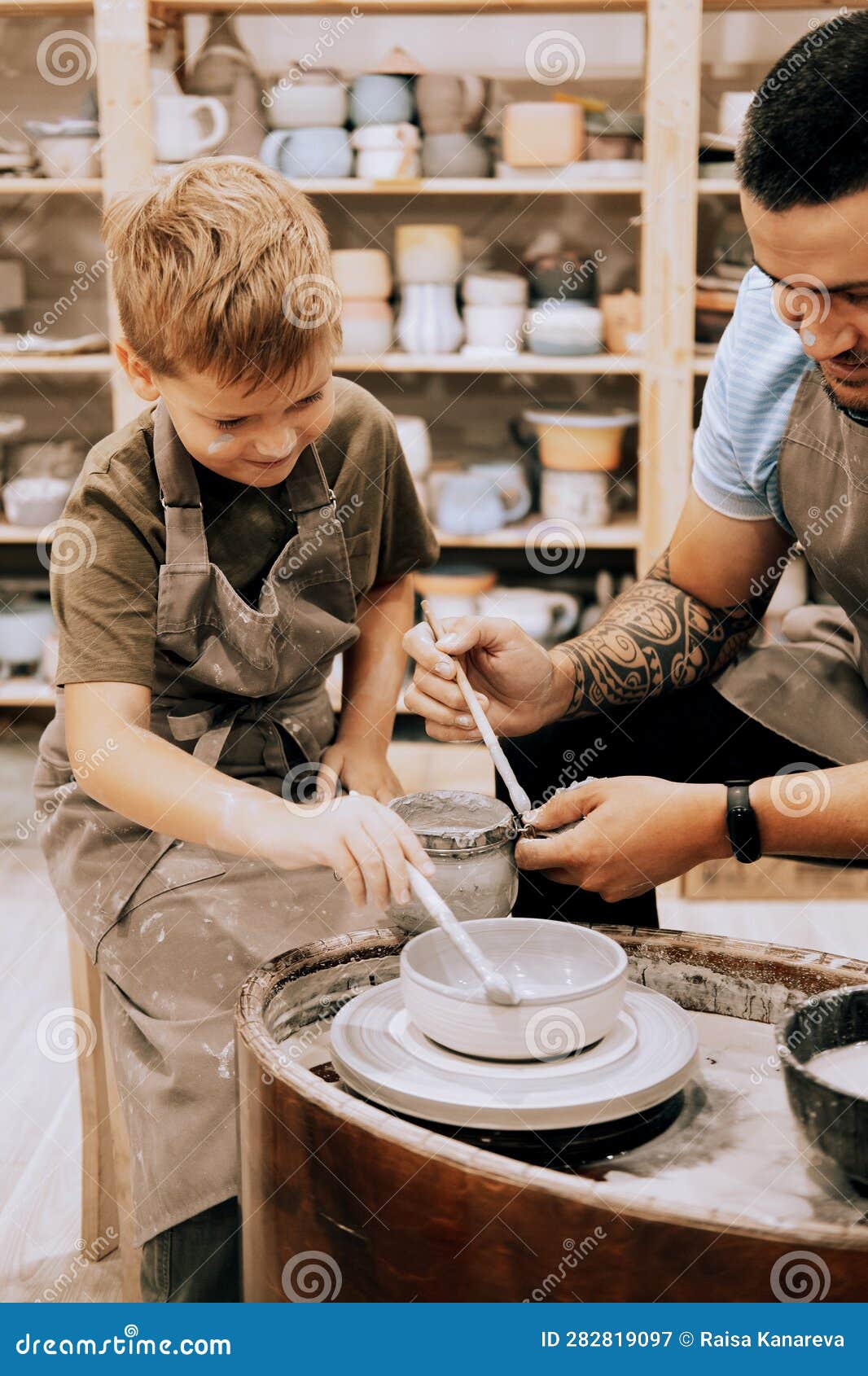 Pottering with Son. Confident Young Man and Little Boy Making Ceramic ...