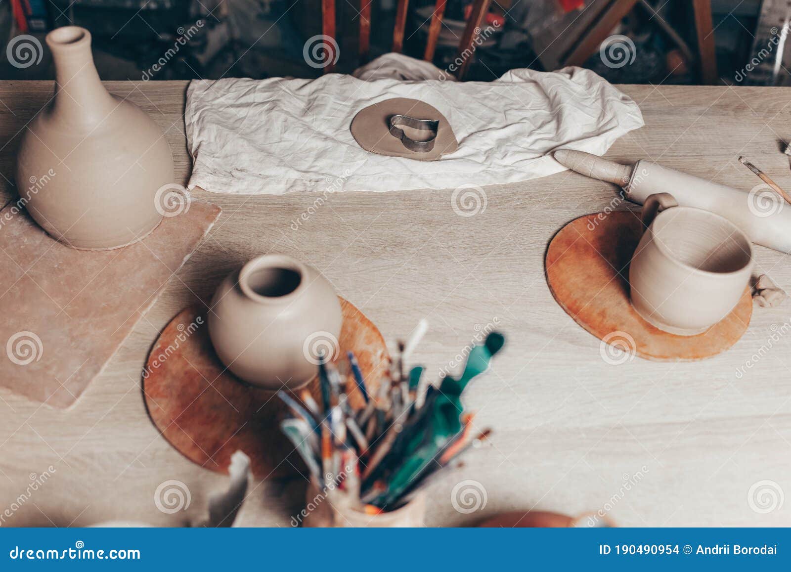 Pottery Creative Mess on the Table. Clay Master`s Workplace Stock Photo ...