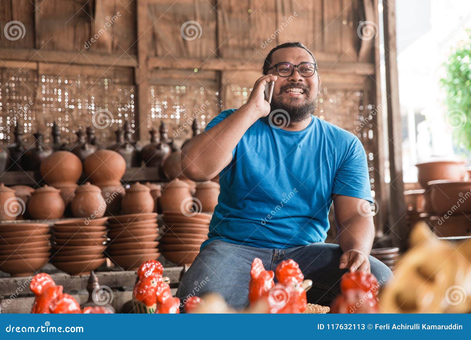 Pottery maker phone call stock image. Image of assistance - 117632113