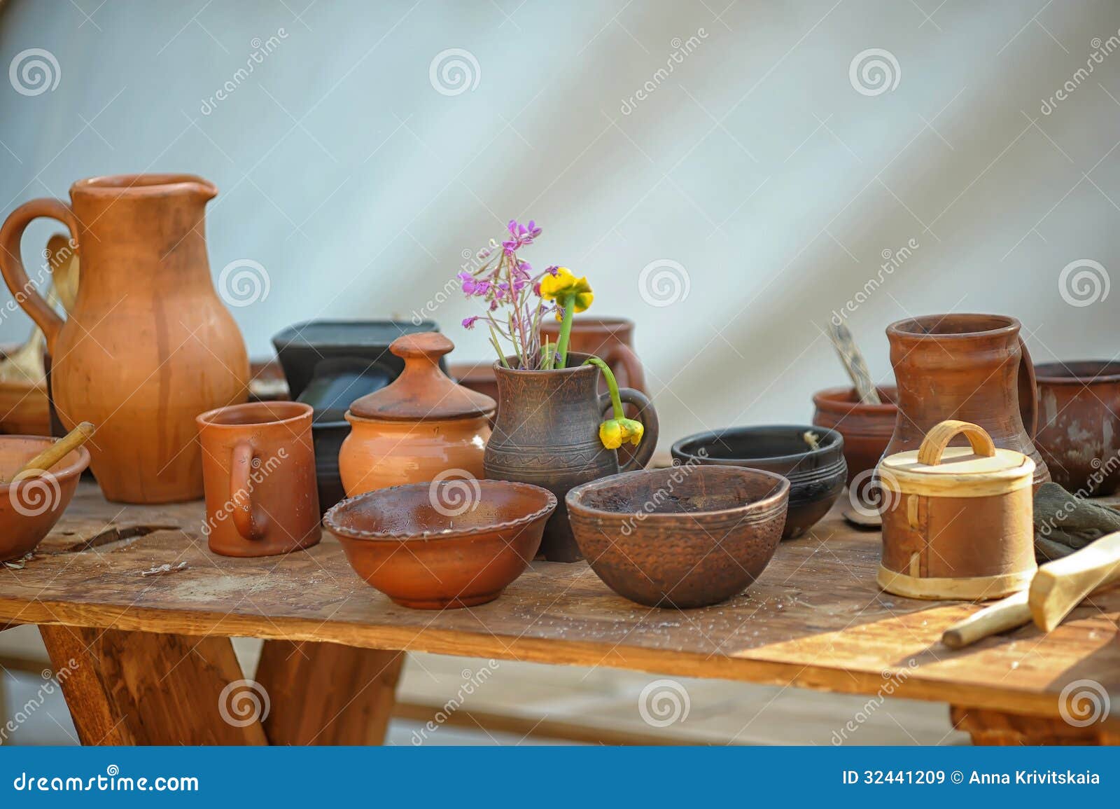 Pottery on the table stock image. Image of arrangement - 32441209