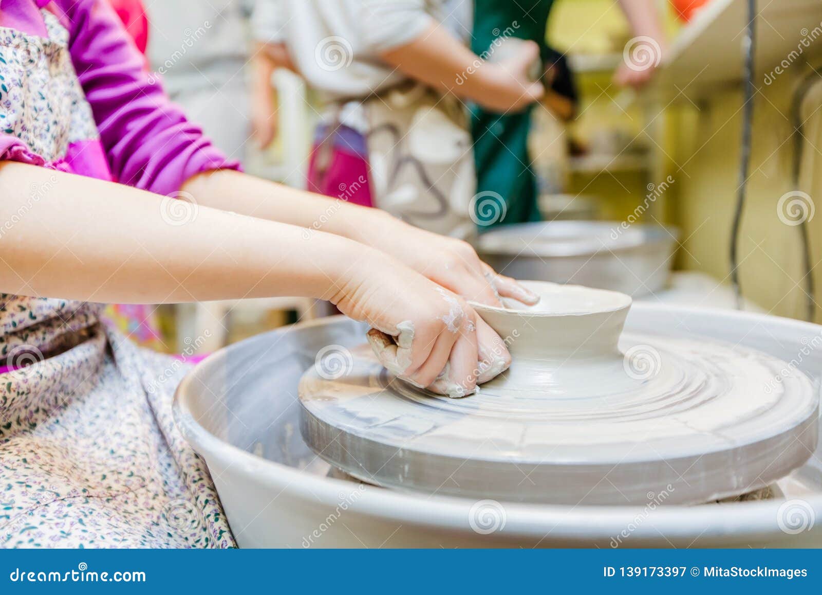 Child Hands Shaping Clay at Wheel Stock Image - Image of making, lesson ...