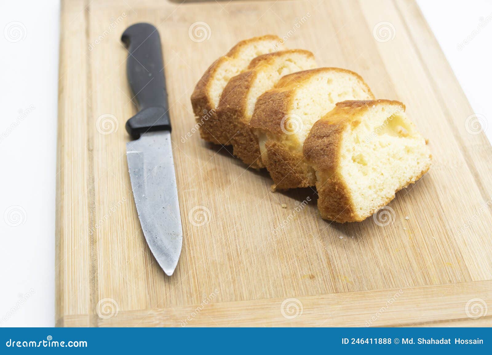 Pound Cake on Cutting Board Isolated on White Background Stock Photo ...