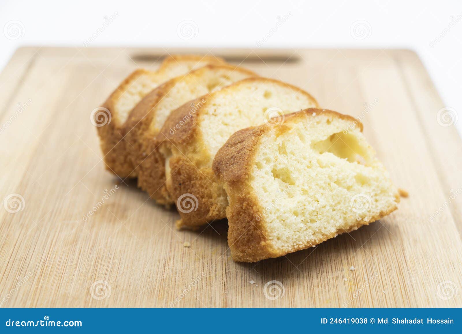 Pound Cake on Cutting Board Isolated on White Background Stock Photo ...