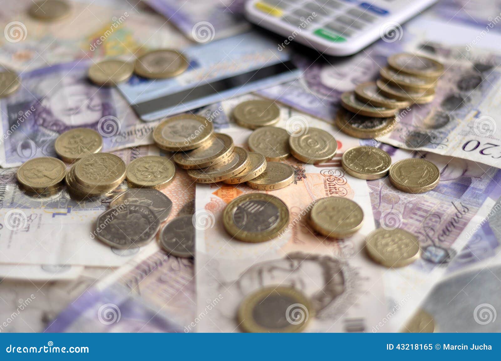 Pound notes and coins editorial image. Image of coins - 43218165