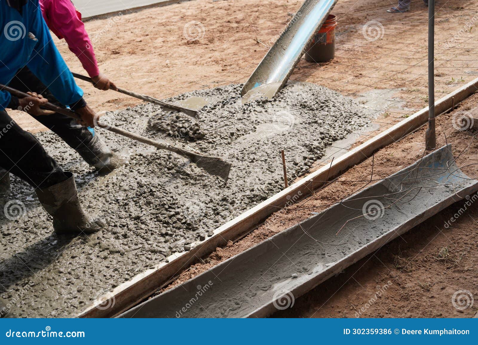 Pour the Concrete and Spread Cement on Bricks Floor Build Stock Photo ...