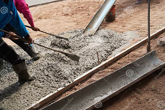 Pour the Concrete and Spread Cement on Bricks Floor Build Stock Photo ...