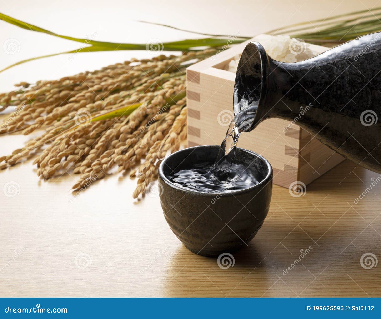 Pour a glass of sake stock photo. Image of food, measure - 199625596