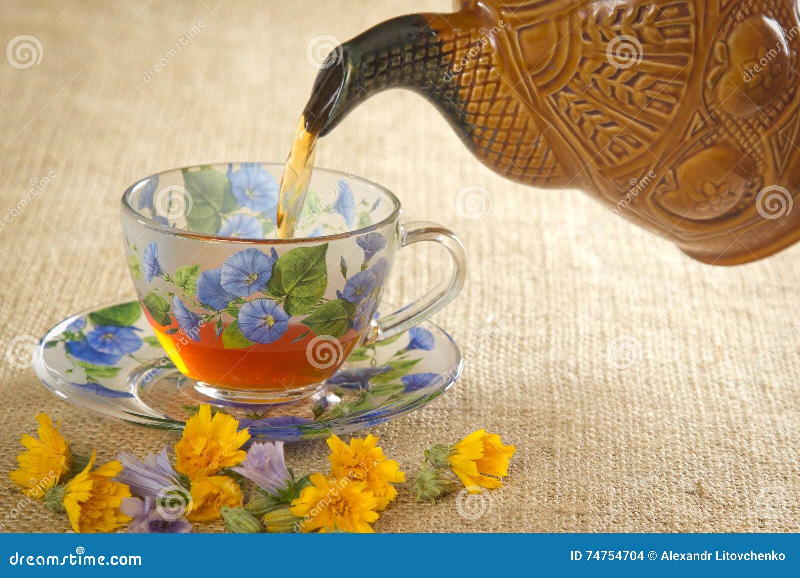 Pour the Tea into a Mug from the Kettle Stock Photo - Image of ...