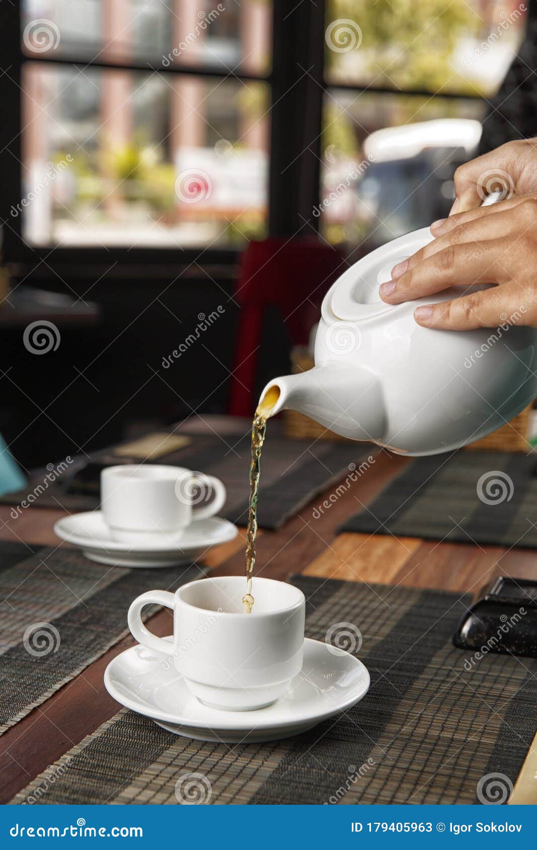 Pour Tea from a Teapot into a Cup Stock Image - Image of health, china ...