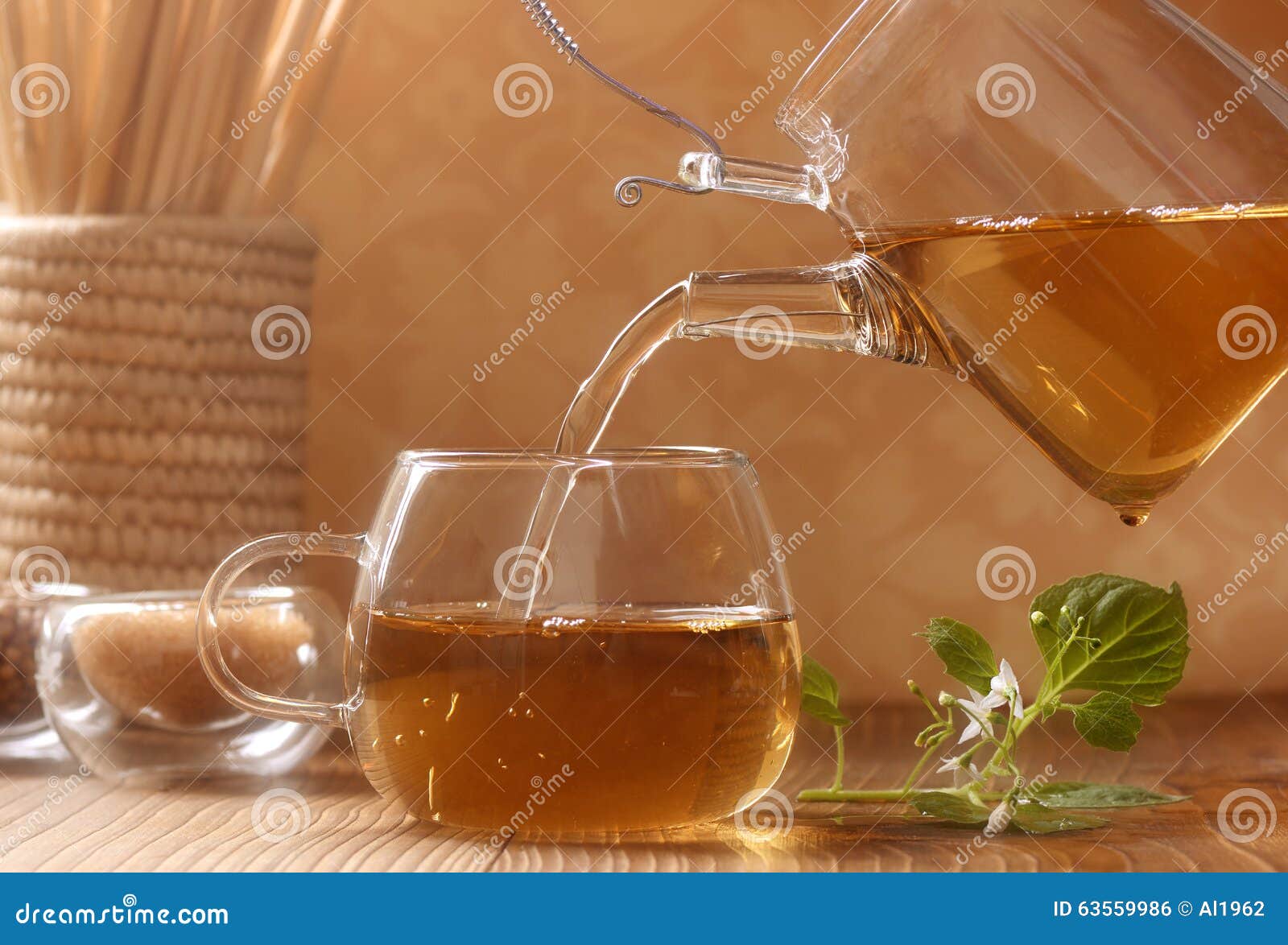 Pour tisane into the cup stock photo. Image of transparent - 63559986