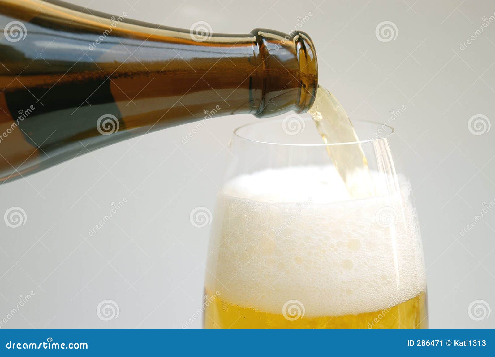 Pouring beer stock image. Image of pouring, pour, brown - 286471