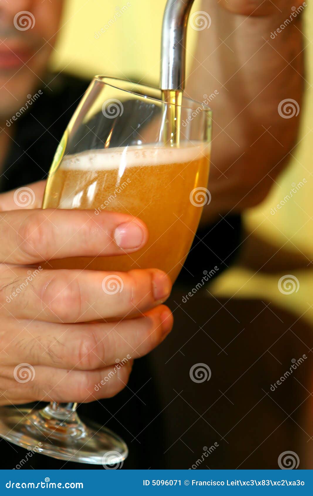 Pouring beer on a glass stock image. Image of alcohol - 5096071