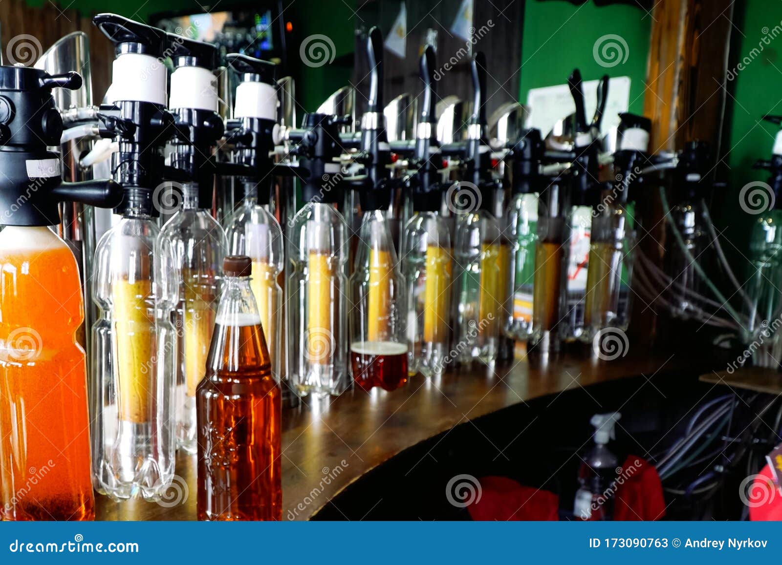 Pouring Beer into Plastic Bottles Stock Image - Image of lager ...