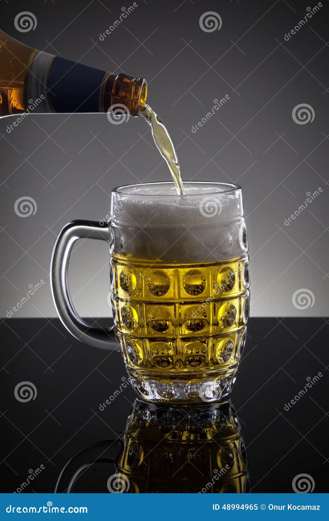 Pouring a beer stock image. Image of froth, drink, pouring - 48994965