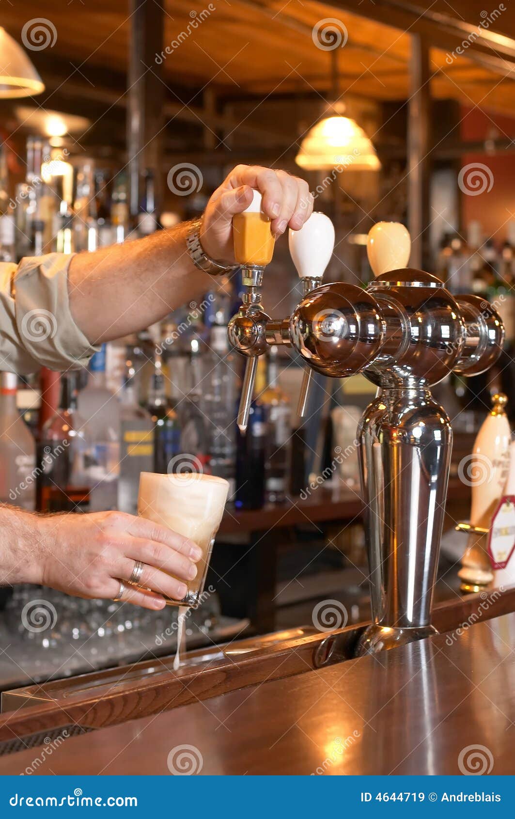 Pouring Beer from Tap stock image. Image of fresh, hands - 4644719