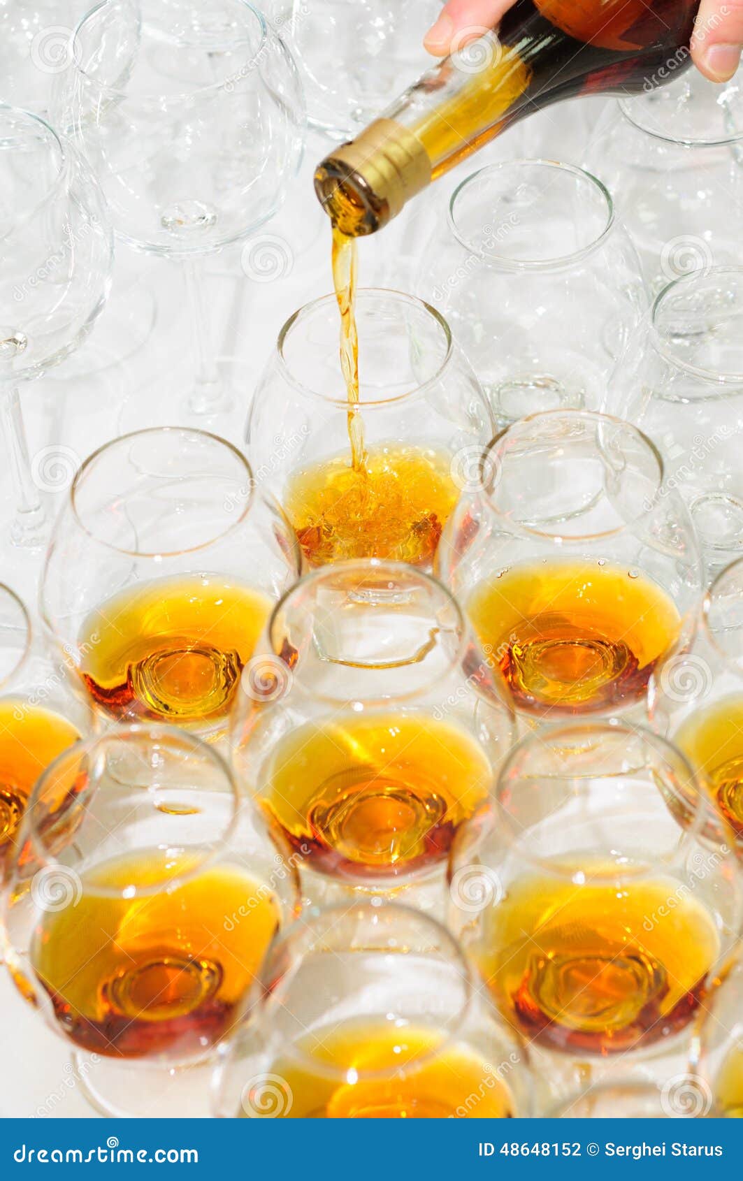 Pouring the Brandy or Cognac Stock Photo - Image of splash, banquet ...
