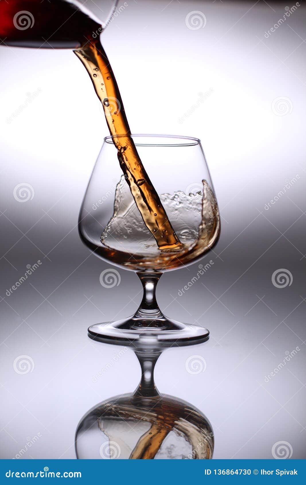 Pouring Brandy into a Glass Stock Photo - Image of orange, exquisite ...
