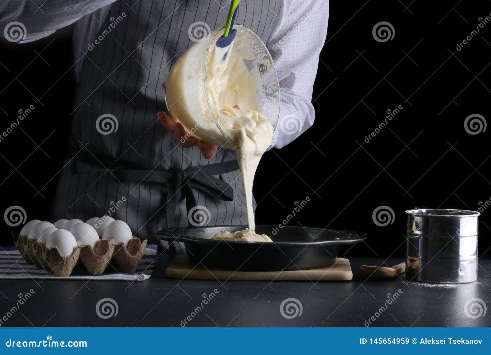 Pouring Cake Dough into Baking Tin. Man Hold Bowl and Pouring Batter ...