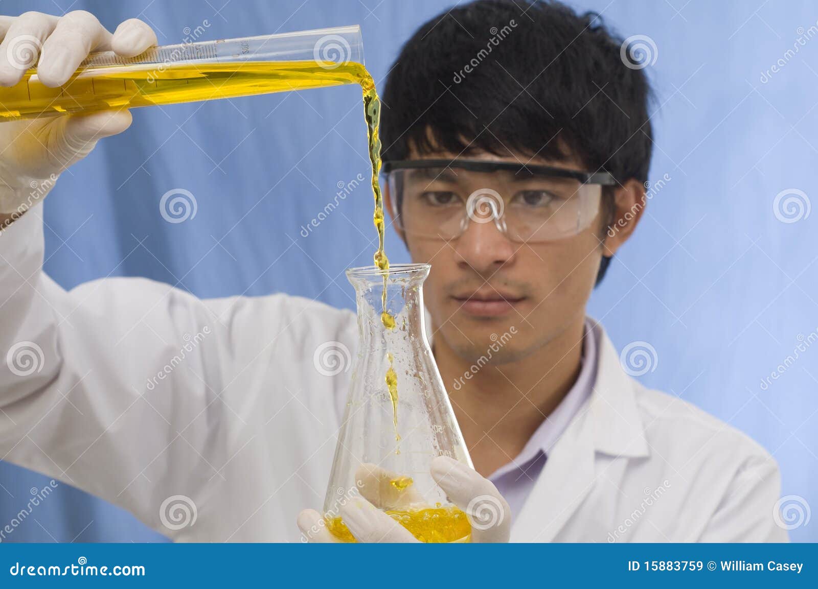 Pouring chemicals stock image. Image of face, examine - 15883759
