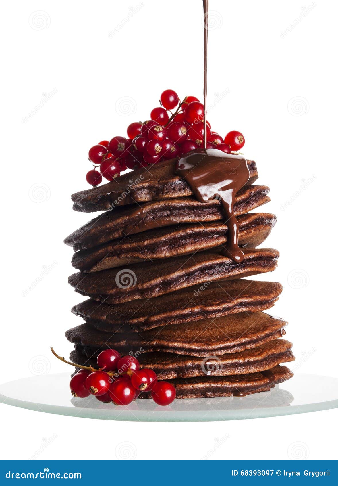 Pouring Chocolate Syrup on Stack of Small Pancakes on White Wit Stock ...