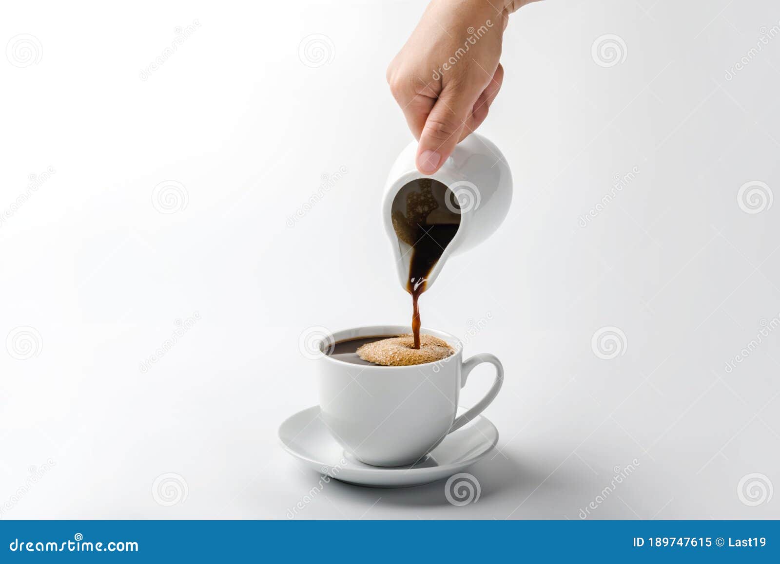 Pouring Coffee on a Cup Isolated on White Background Stock Image ...