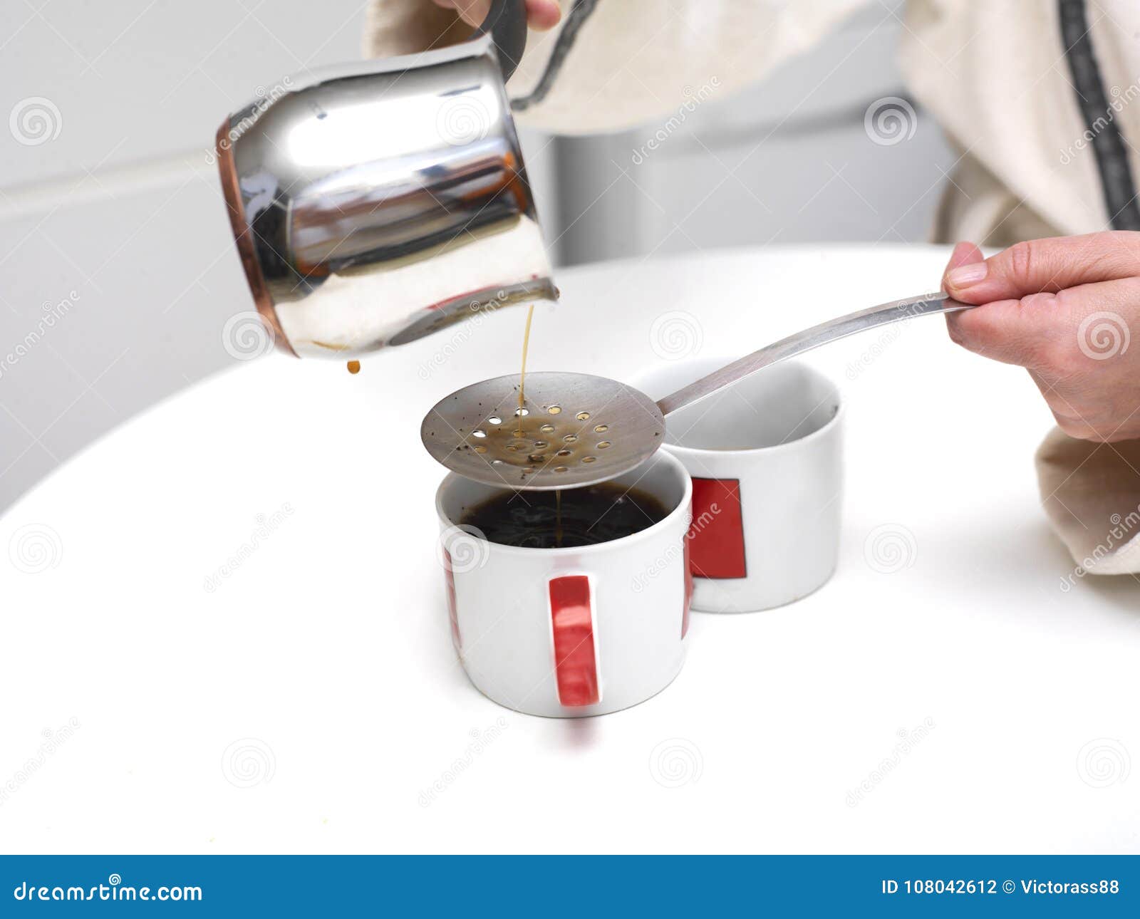 Pouring Coffee through Stainer Stock Photo - Image of indoor, home ...