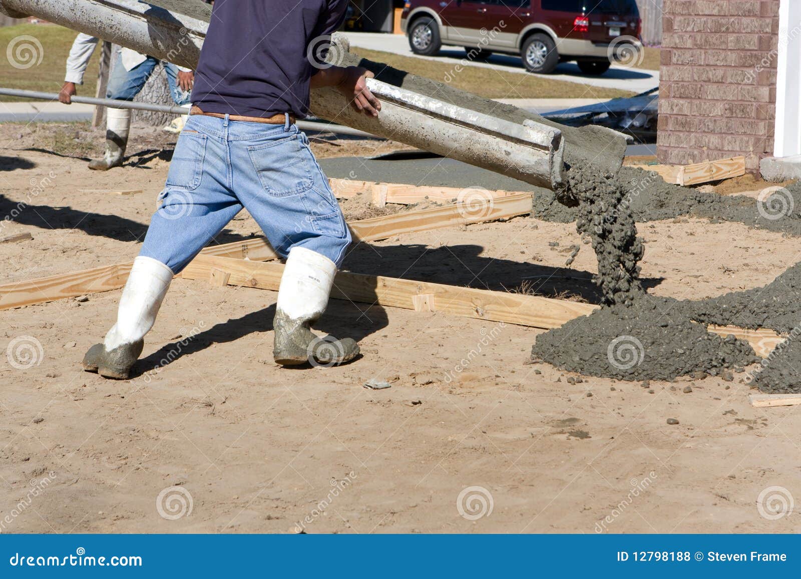 Pouring Concrete Driveway stock photo. Image of construction - 12798188