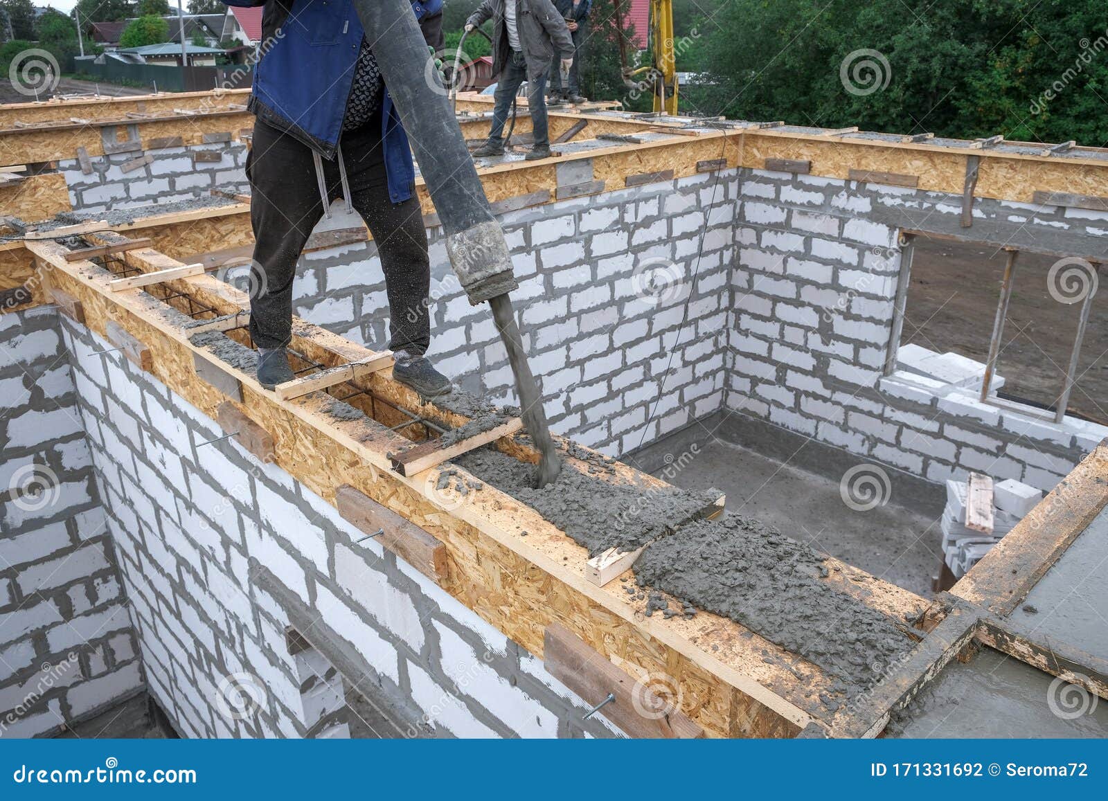Pouring Concrete into the Formwork at the Construction Site Stock Photo ...