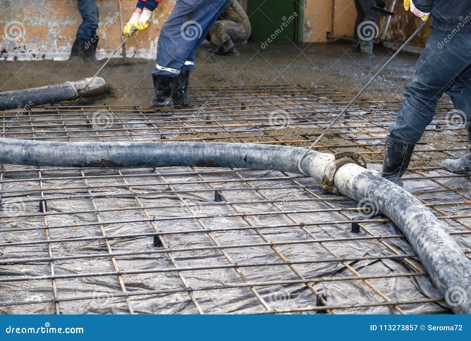 Pouring concrete slab stock image. Image of texture - 113273857