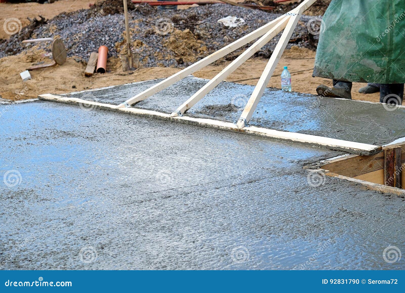 Pouring concrete slab stock photo. Image of contractor - 92831790