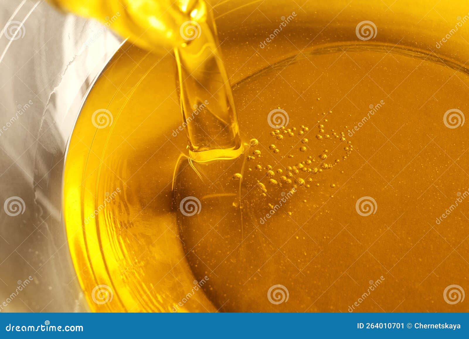 Pouring Cooking Oil into Bowl, Closeup View Stock Image - Image of ...