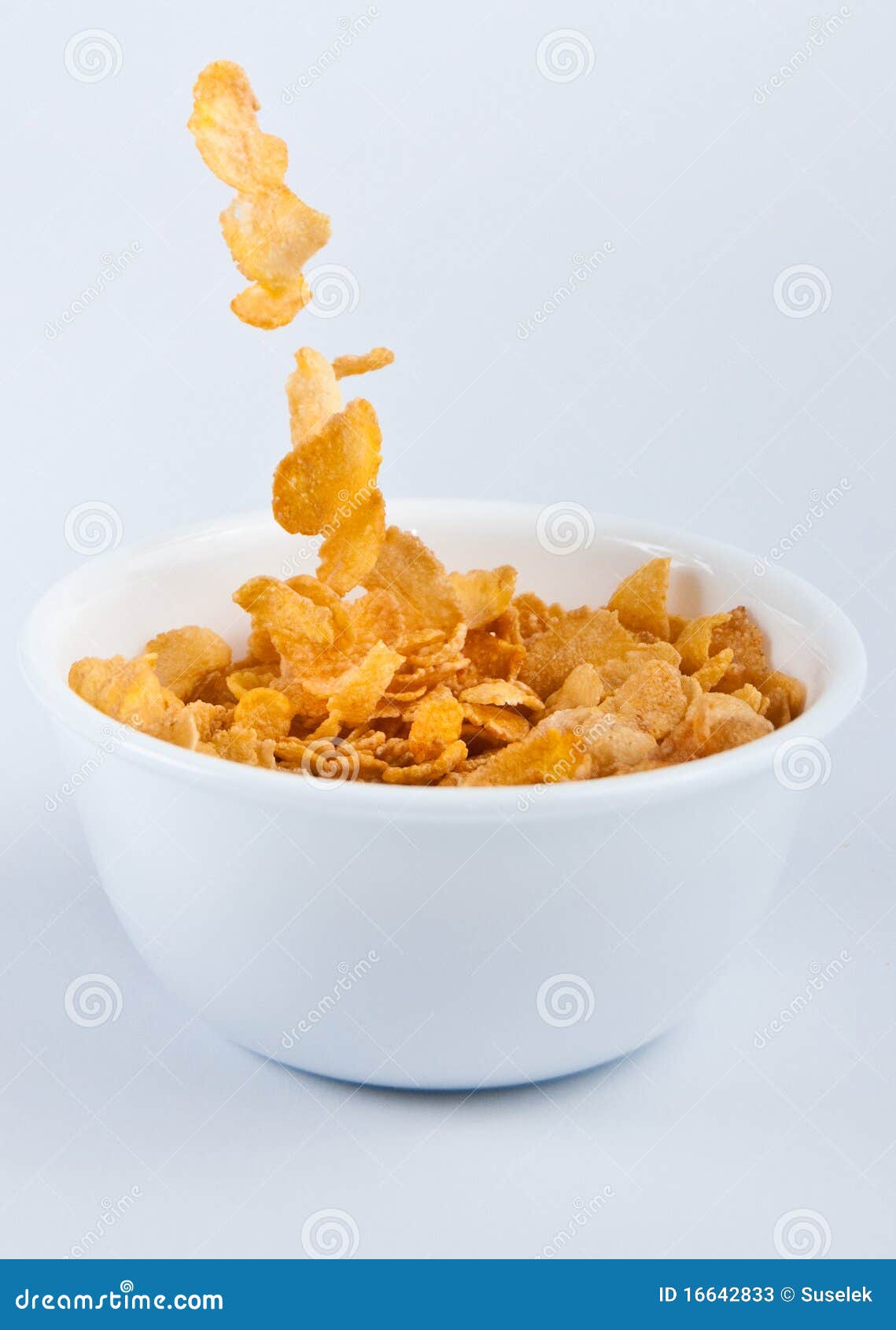 Pouring corn flakes stock image. Image of flakes, morning - 16642833