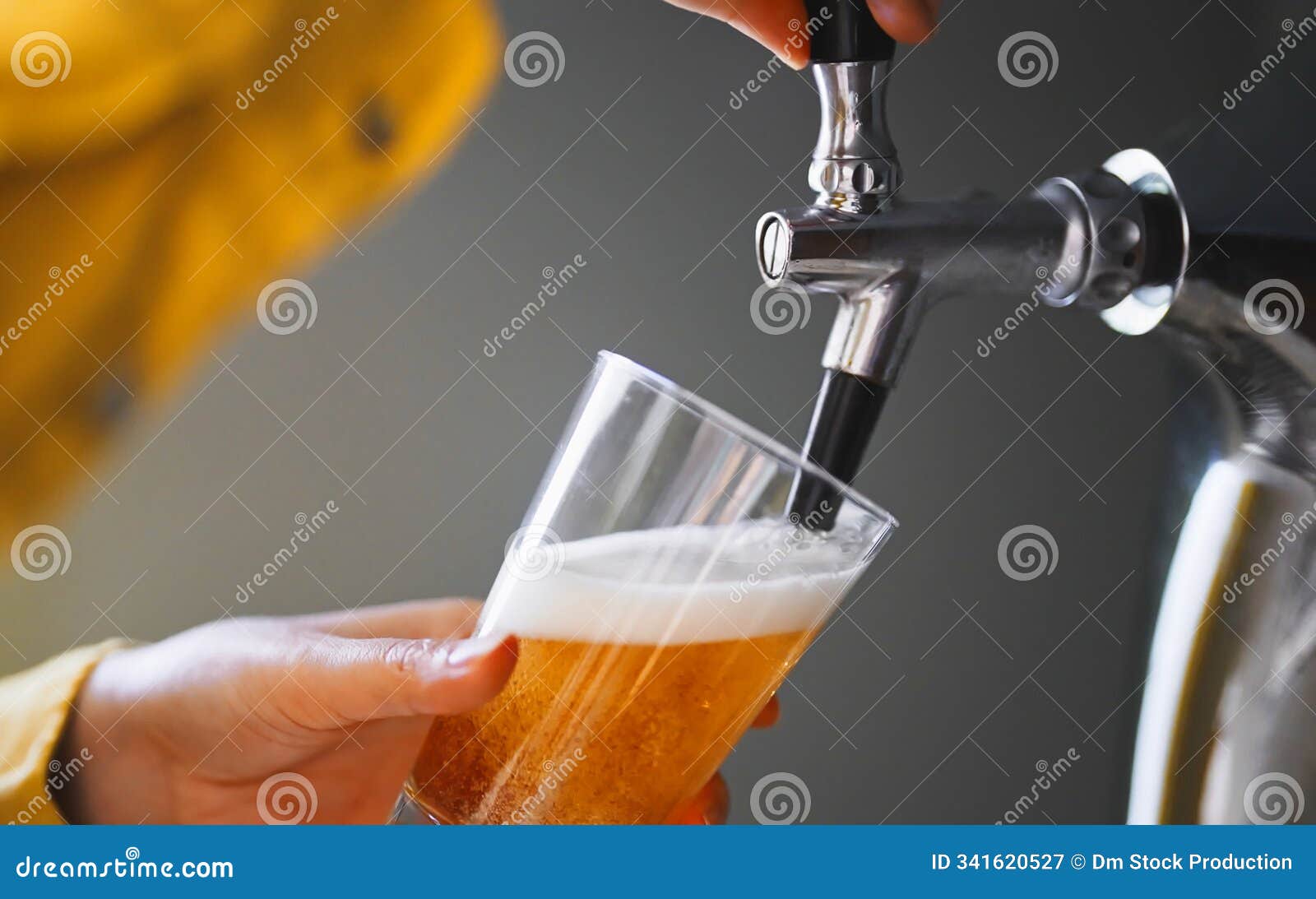 Man Pouring Craft Beer From Beer Taps In Frozen Glass With Froth ...