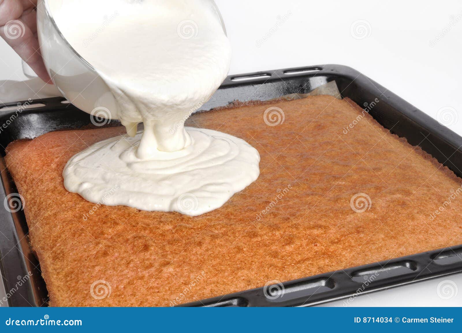 Pouring cream on cake stock photo. Image of hand, base - 8714034