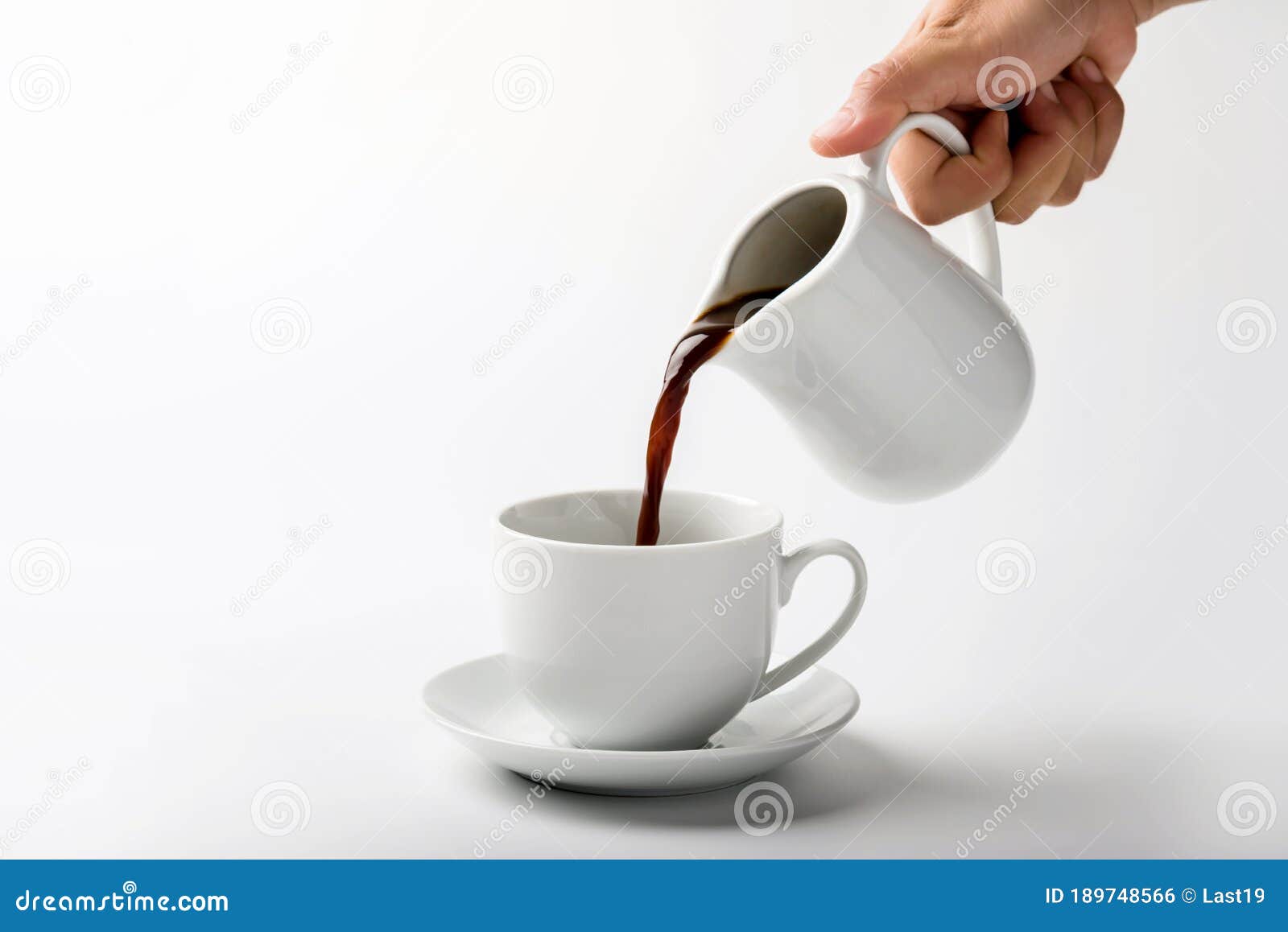 Pouring a Cup of Coffee Over White Background Stock Photo - Image of ...