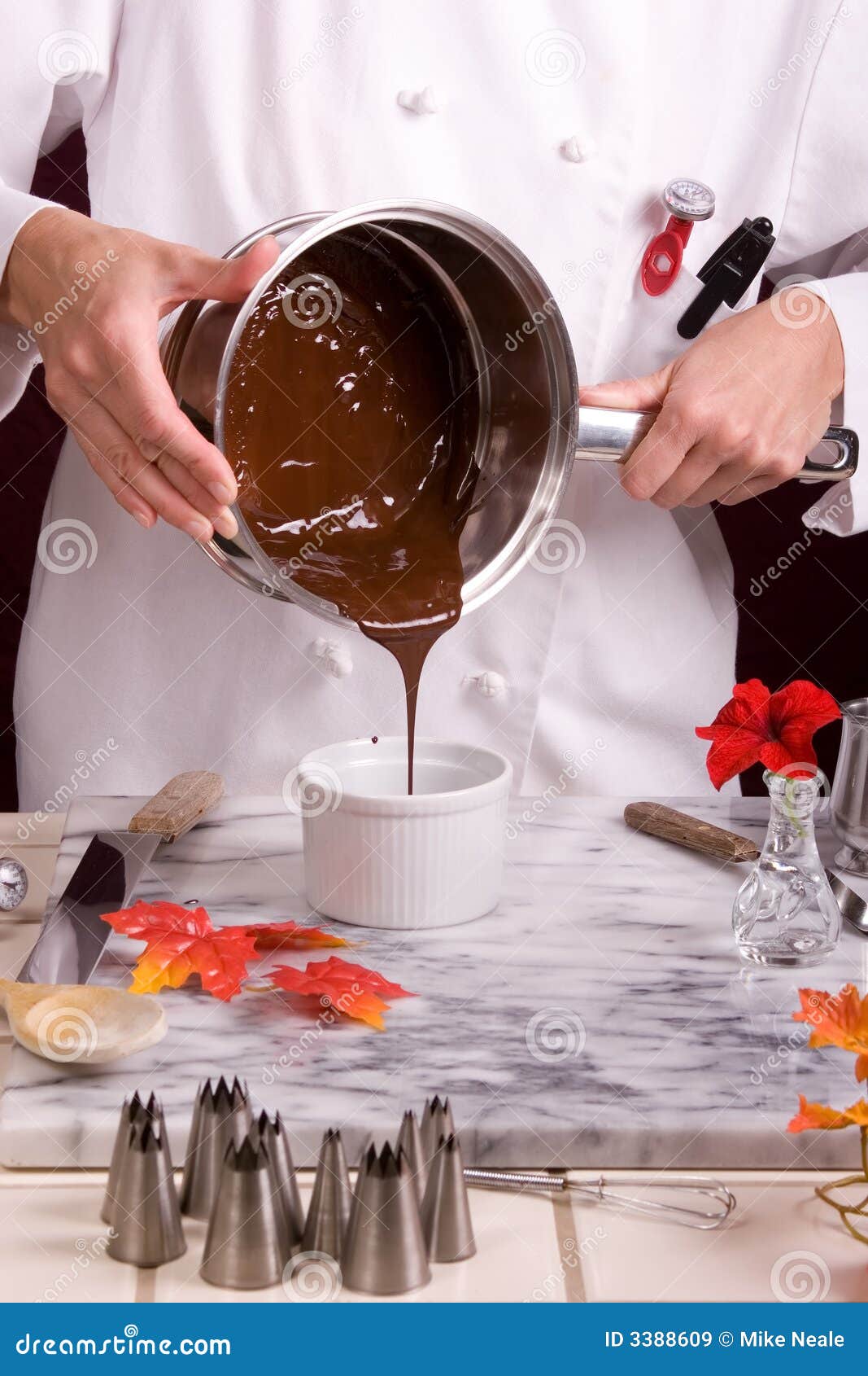 Pouring Dark Chocolate stock image. Image of kitchen, hand - 3388609