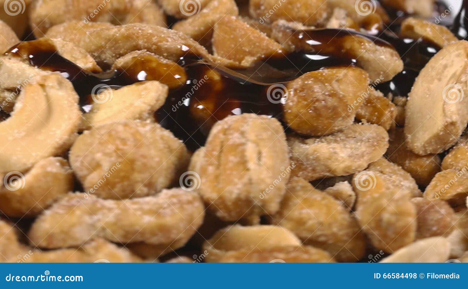 Pouring Delicious Chocolate Syrup Over Mixed Nuts Stock Footage - Video ...