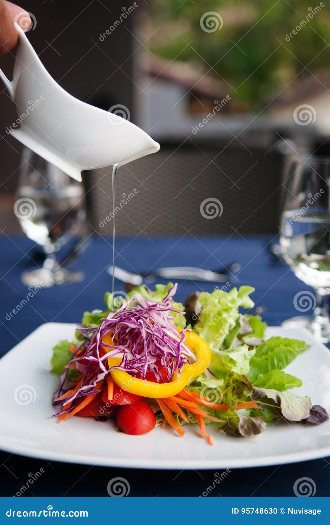 Pouring Dressing Sauce Over A Delicious Mashed Potatoe With Chicken ...