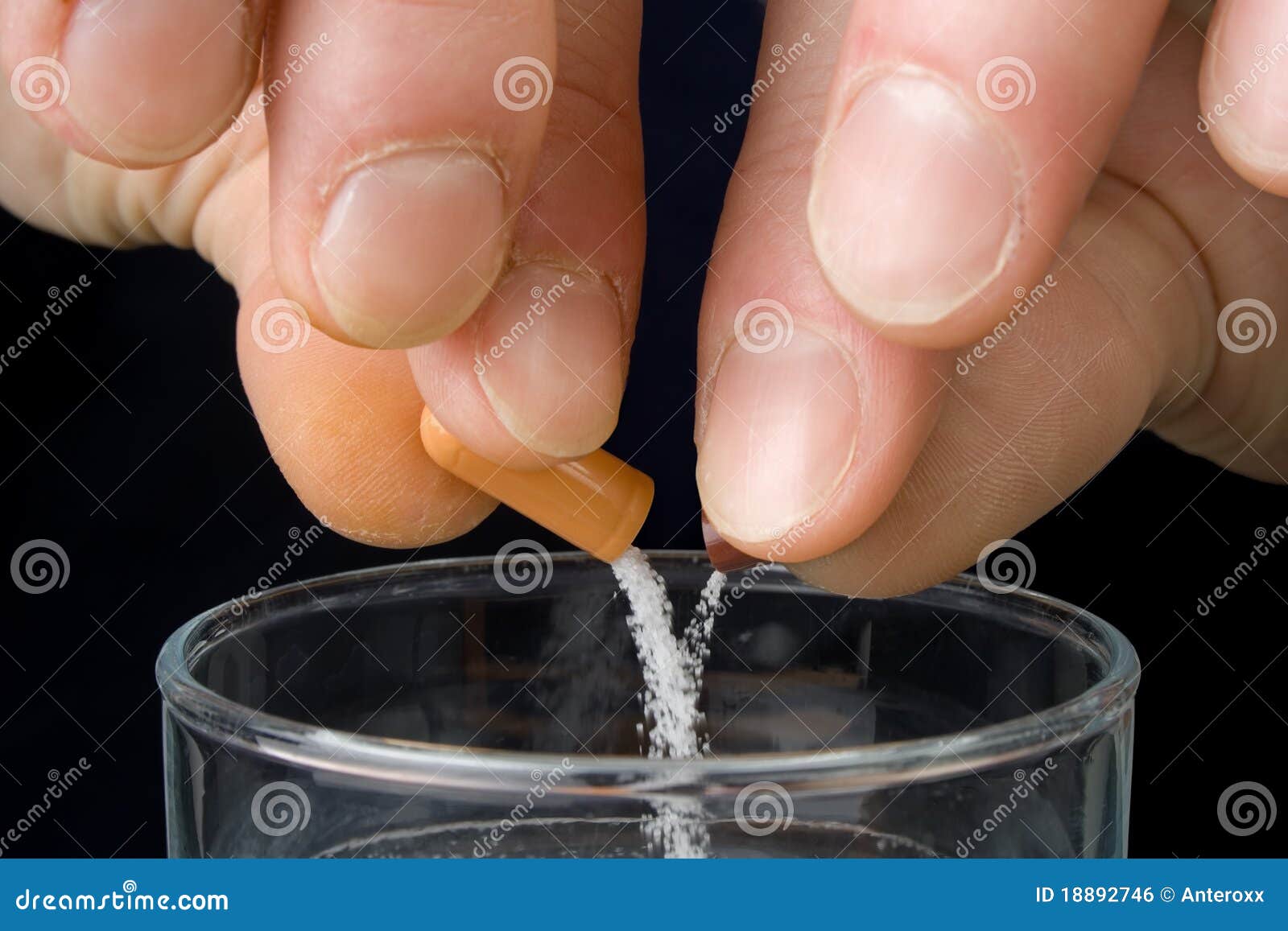 Pouring drug into glass stock photo. Image of pharmacy - 18892746