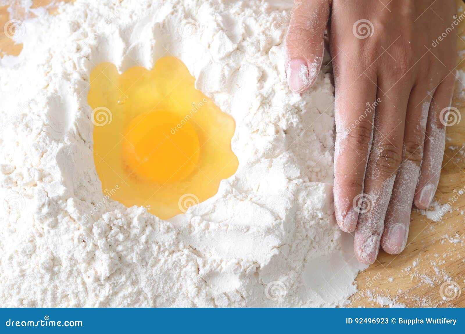 Pouring Egg Yolk Mixing with Flour Stock Image - Image of cook, cuisine ...