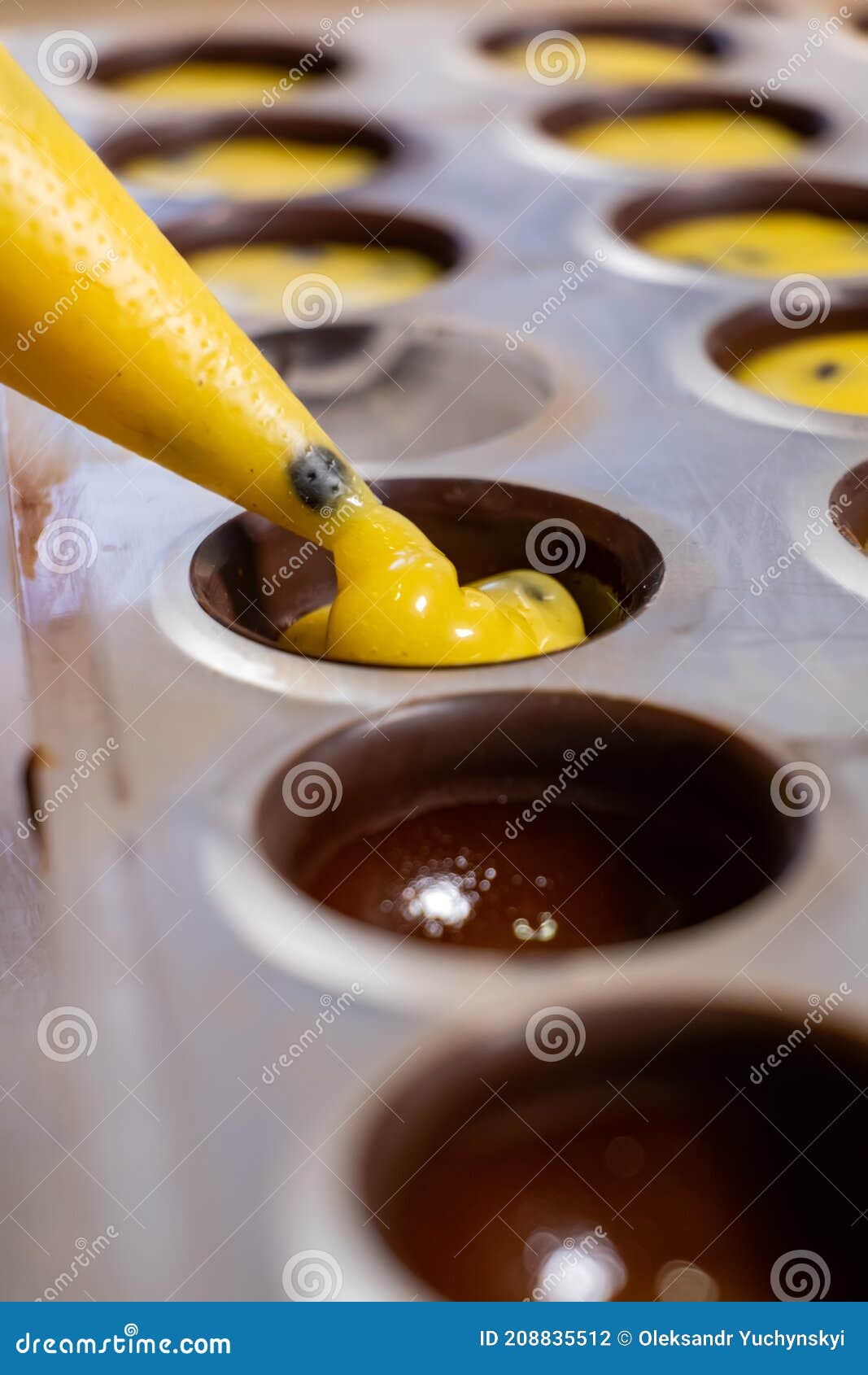Pouring the Filling into Candies during the Manufacturing Process Stock ...