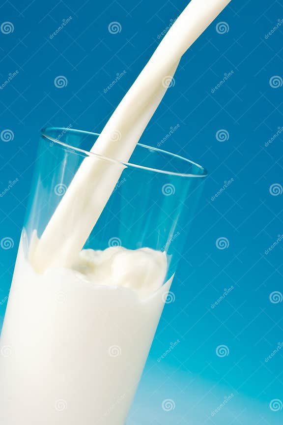 Pouring fresh cool milk stock photo. Image of filling - 9436432