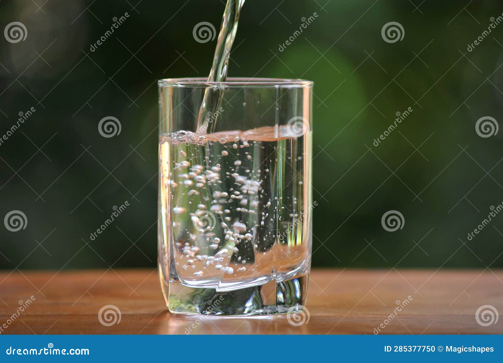 Pouring Fresh Water into a Glass Stock Photo - Image of pour, close ...